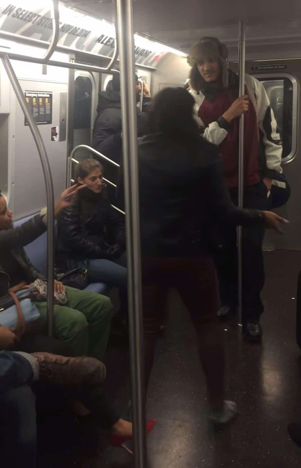 F train Video: Man smacks the soul out of girl on the NY Subway. 4 arrested