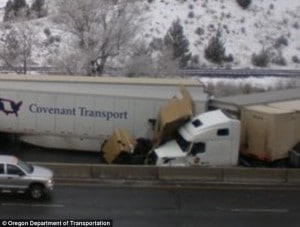 Pictures: Kaleb Whitby survives mangled truck crash stuck between two rigs